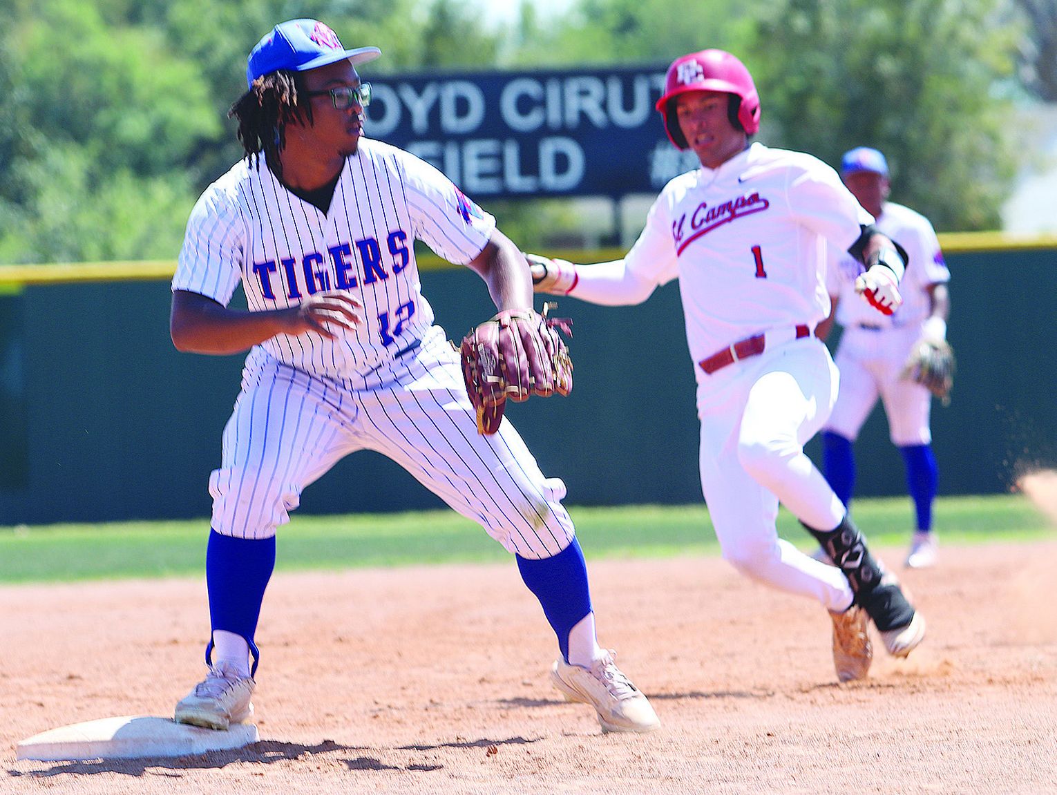Tigers out hit by Ricebirds, lose 14-1